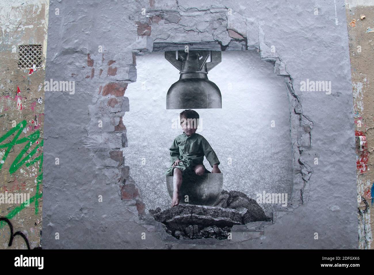 A poster by the afghan street artist Kabir Mokamel in the streets of ...