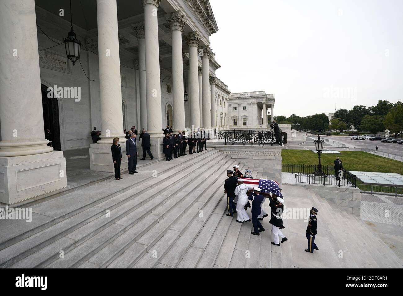 The flag-draped casket of Justice Ruth Bader Ginsburg is carried by a ...