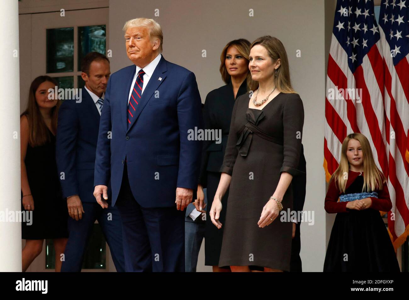 U.S. President Donald Trump arrives with Judge Amy Coney Barrett and ...