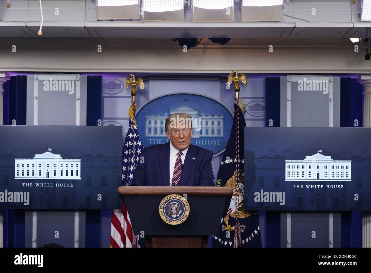 United States President Donald Trump holds a news briefing at the White ...