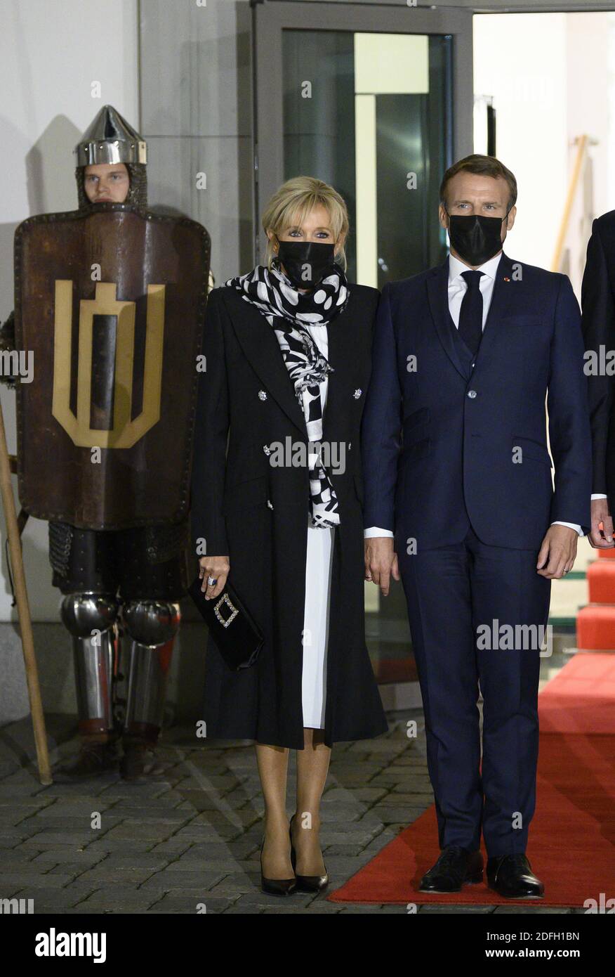 French President Emmanuel Macron and his wife Brigitte pose as they ...
