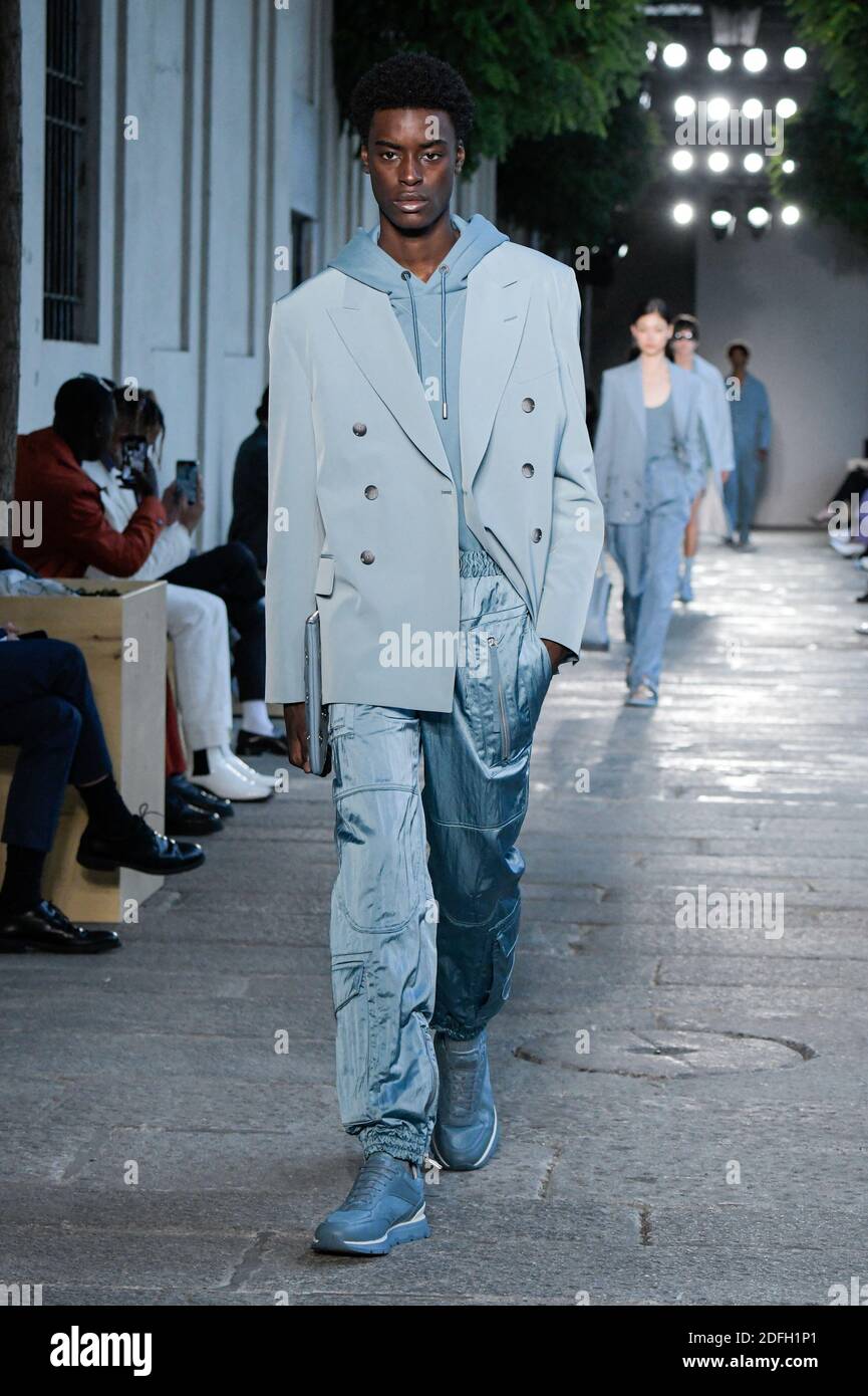 A model walks the runway at the Hugo Boss fashion show during the Milan ...