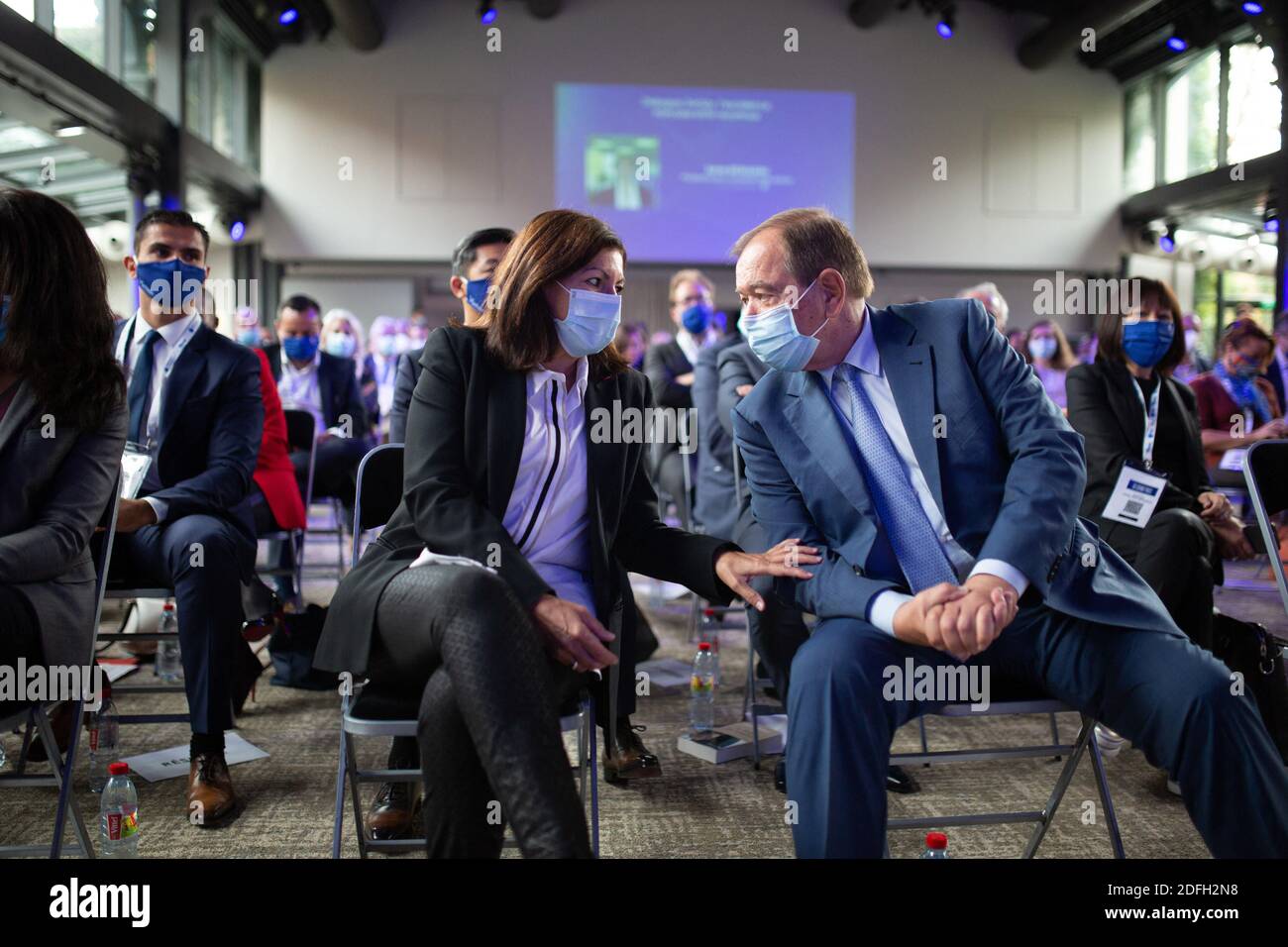Mayor of Paris Anne Hidalgo, Audrey Pulvar, and president of the Grand ...