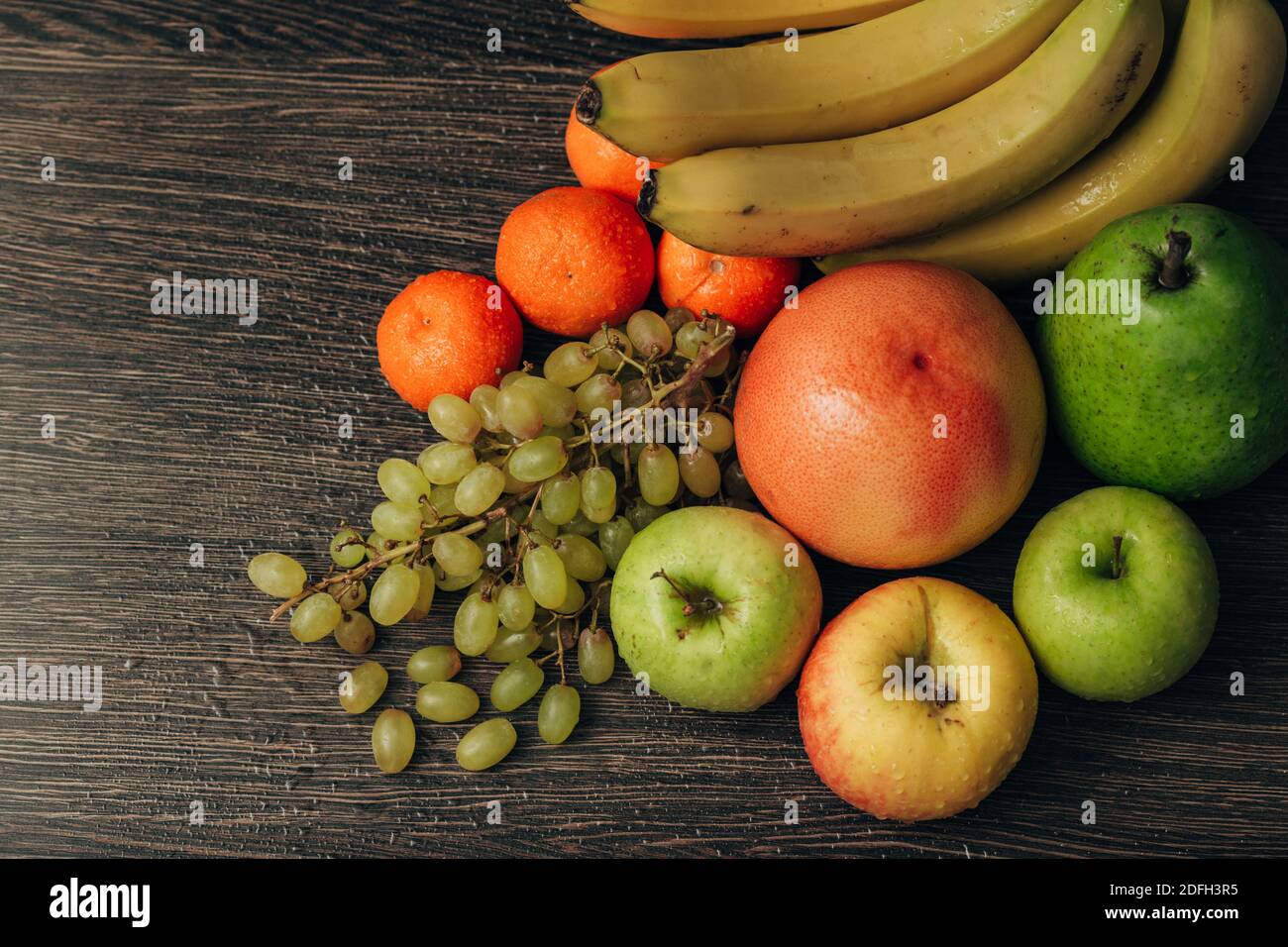 Composition with Summer Colorful Fruits on Wooden Brown Background ...