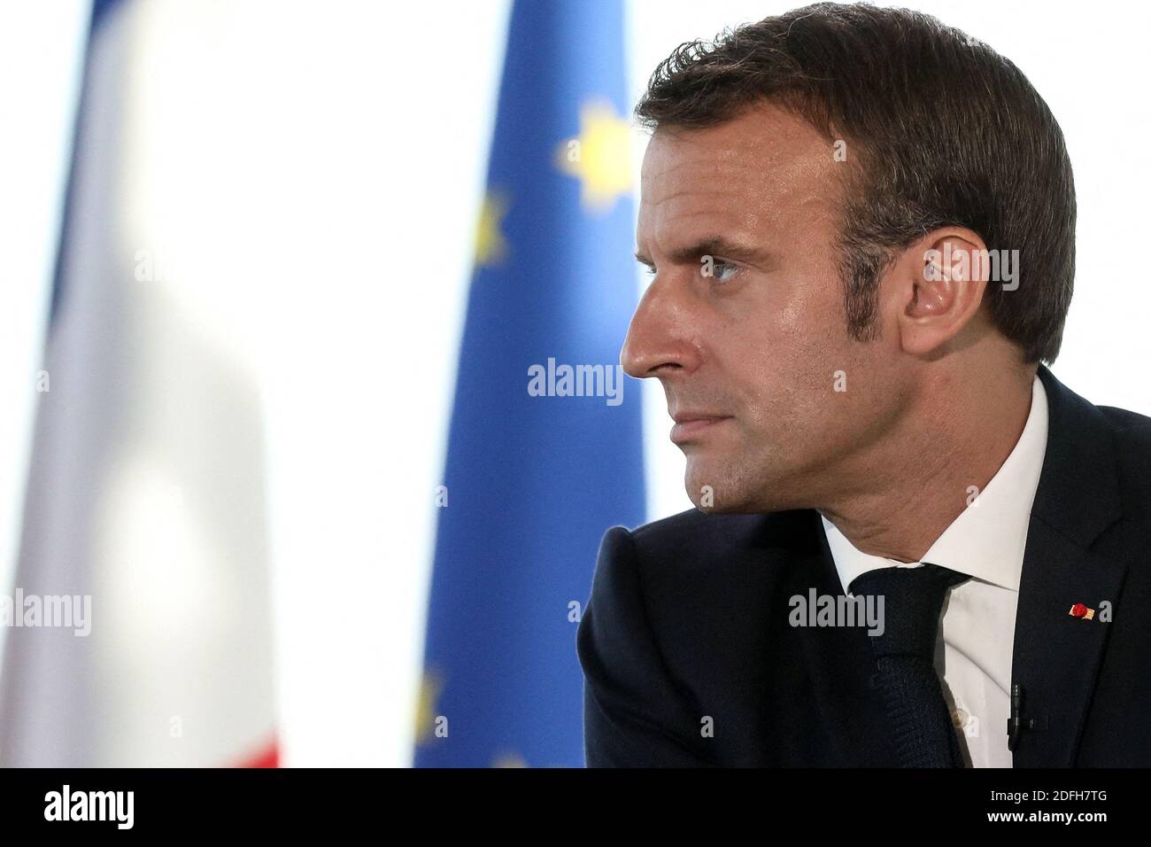 French President Emmanuel Macron takes part in a round table at the ...