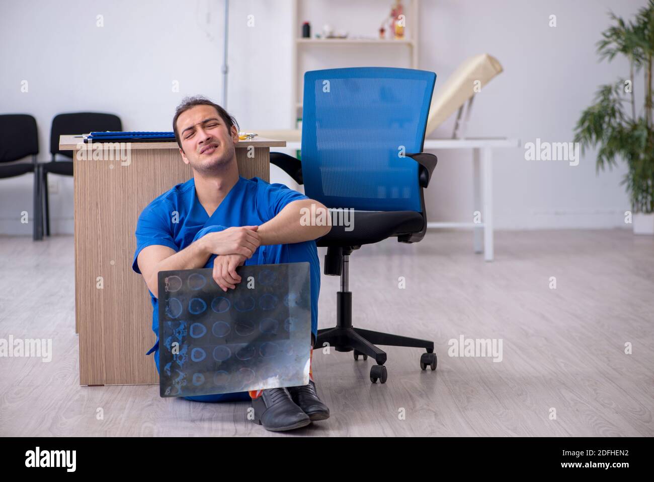 Young doctor radiologist being unhappy after night shift Stock Photo ...