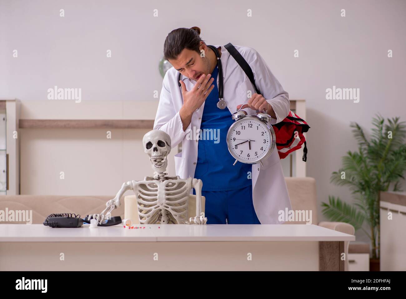 Male paramedic visiting skeleton patient Stock Photo - Alamy
