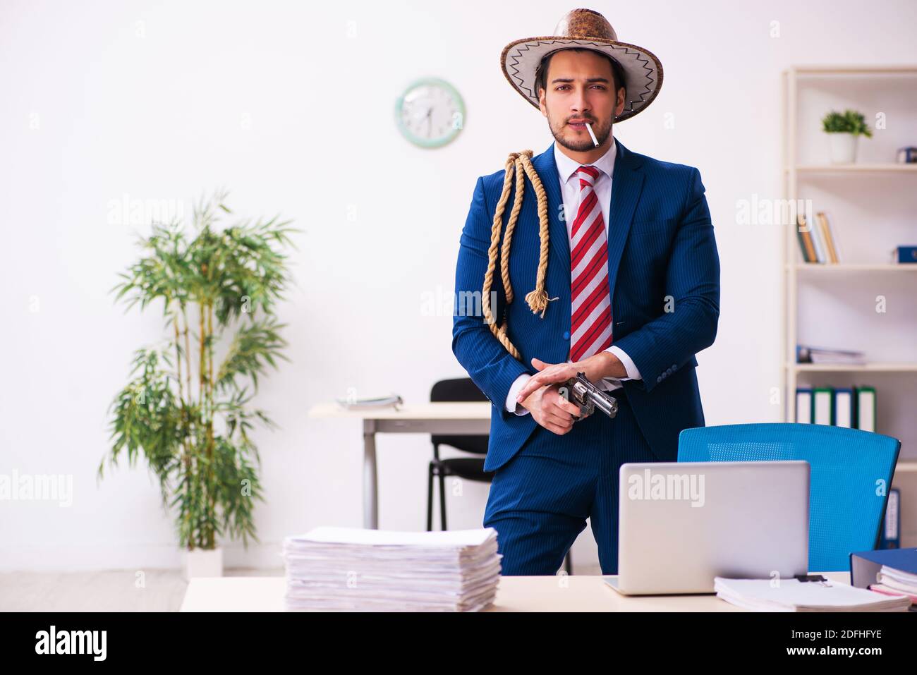 Young cowboy smoking cigarette hi-res stock photography and images - Alamy