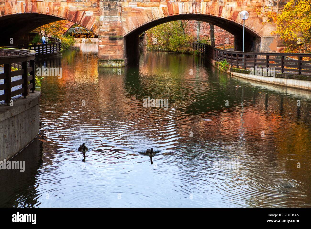 Medieval bridge with curved arches over the river Stock Photo - Alamy