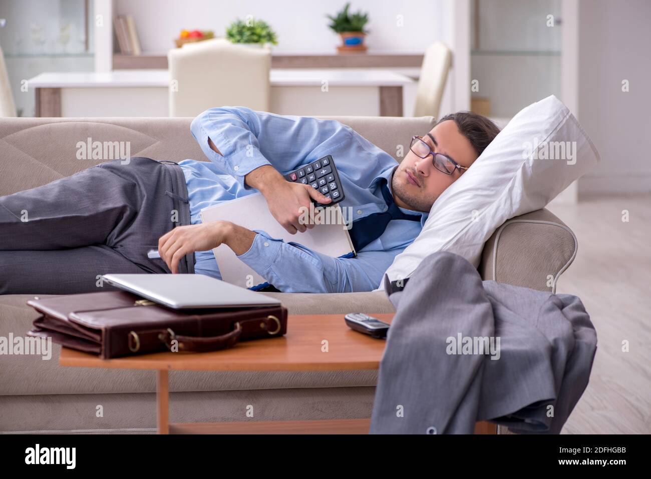 Tired businessman employee working from the home Stock Photo - Alamy
