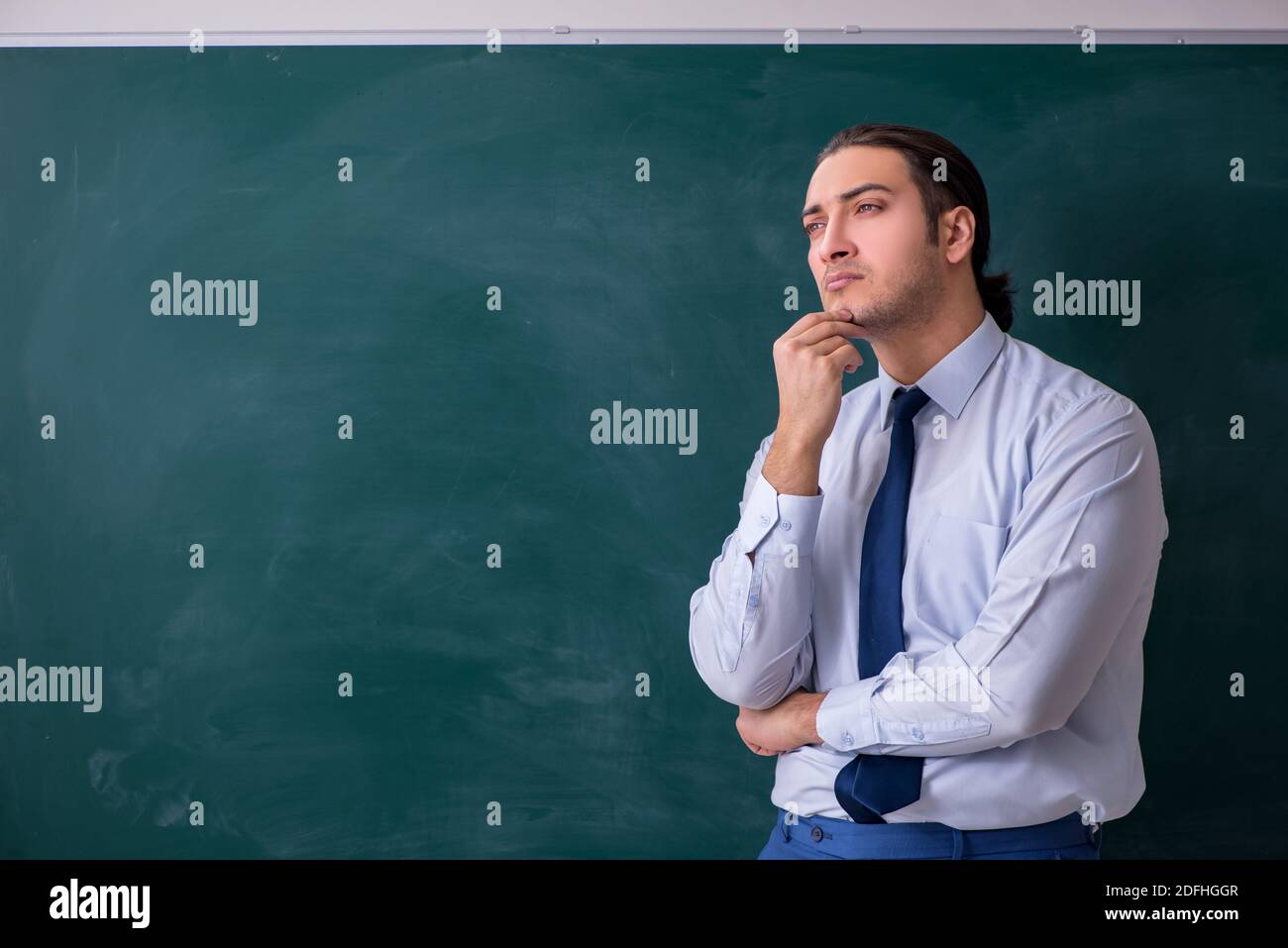 Young man employee presenting in the office Stock Photo - Alamy