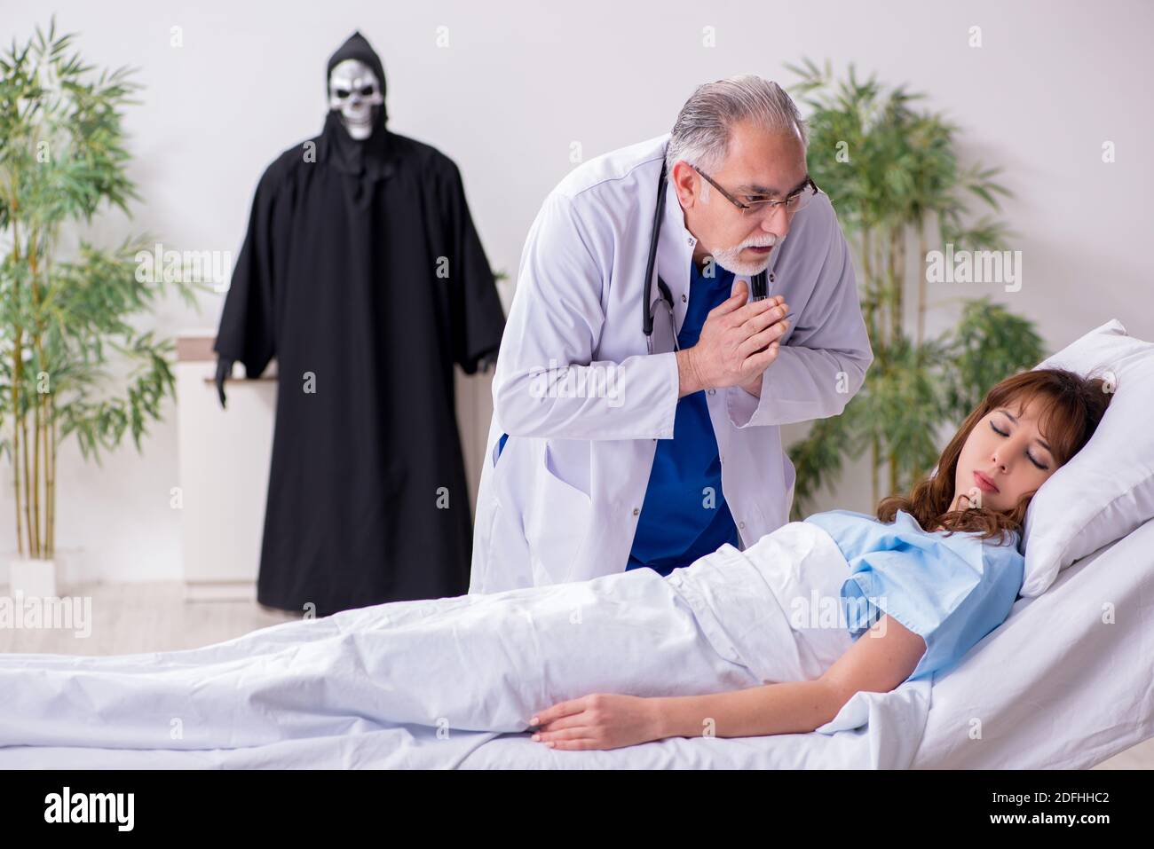 Devil, old doctor and female patient in clinic Stock Photo - Alamy
