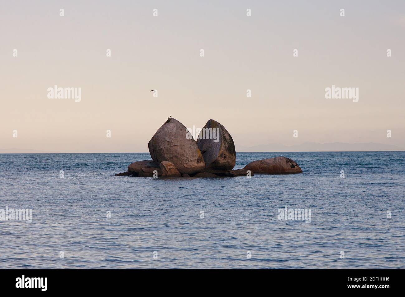 Split apple rock beach hi-res stock photography and images - Alamy