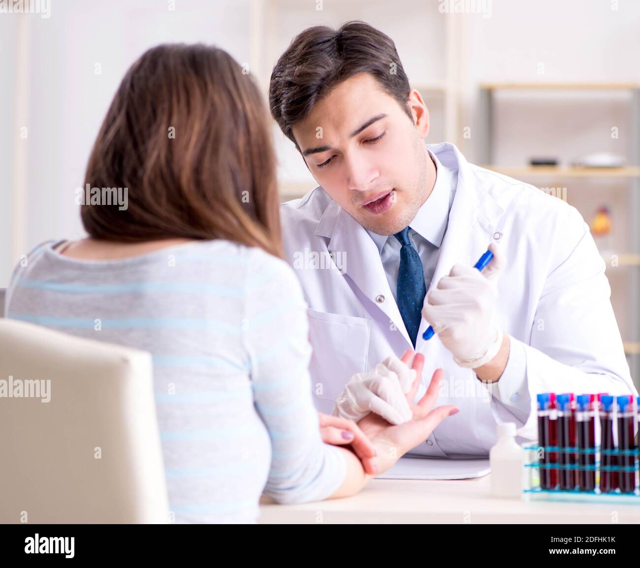 The patient during blood test sampling procedure taken for analysis ...