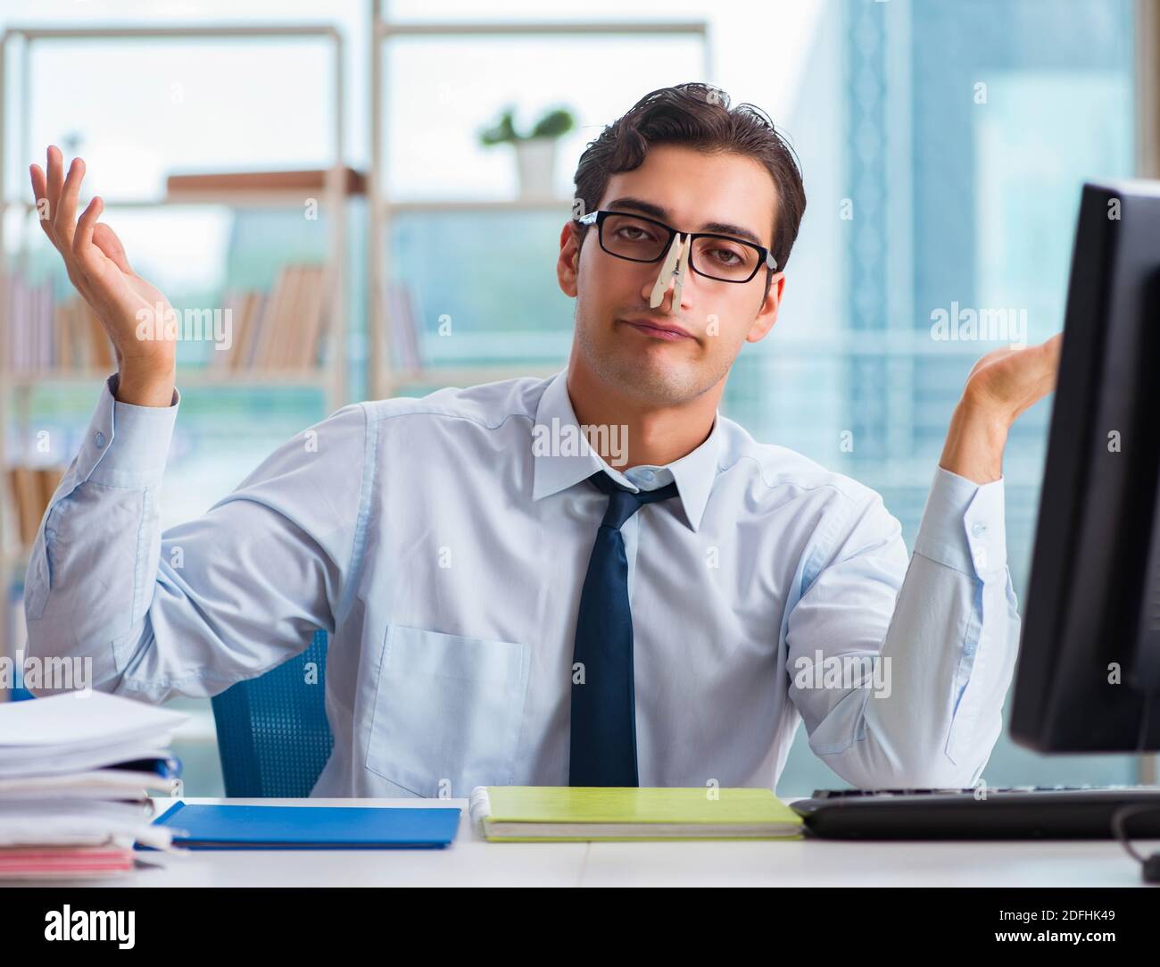 The businessman suffering from excessive armpit sweating Stock Photo ...
