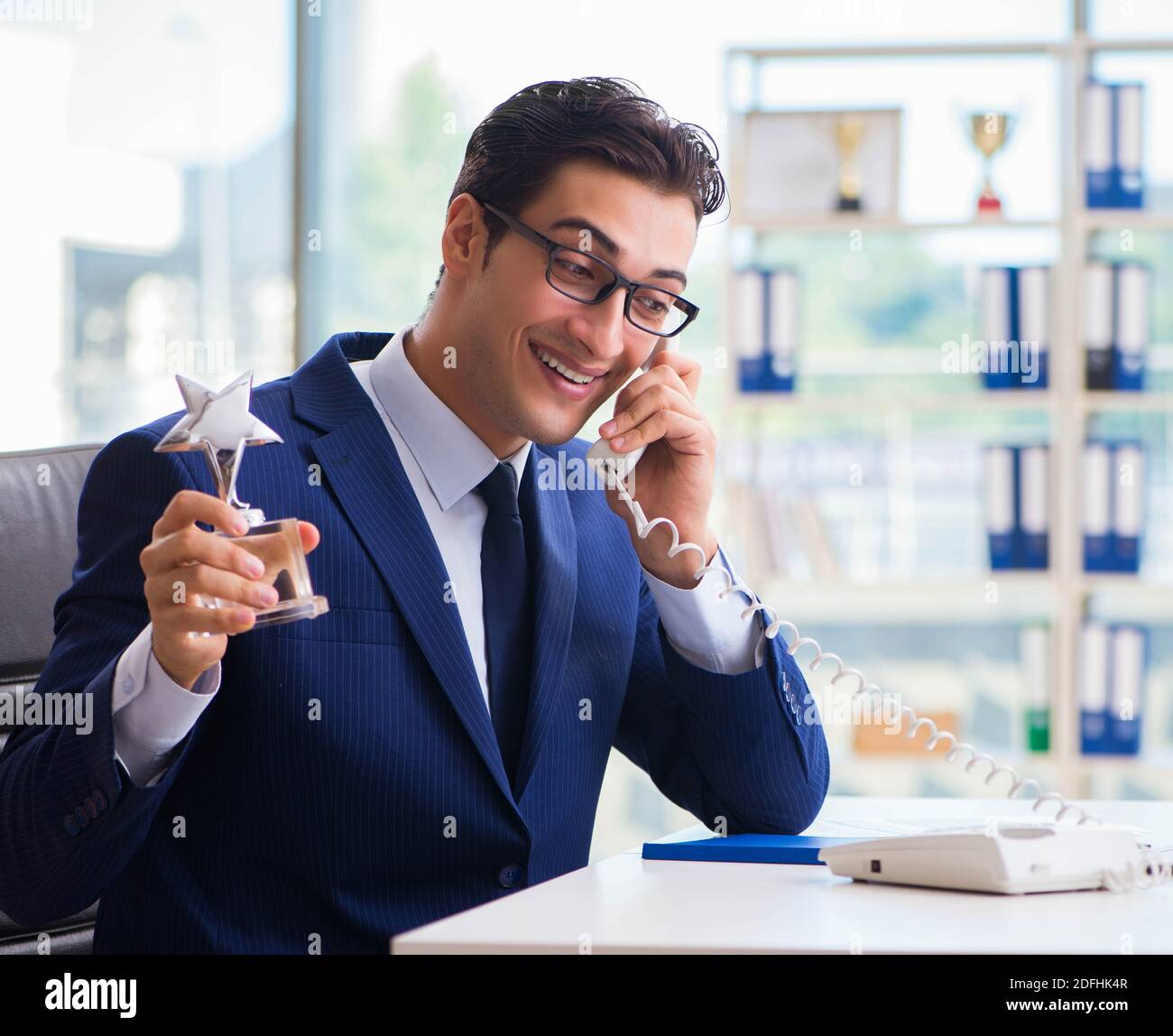 The businessman winning best employee of the month award Stock Photo ...