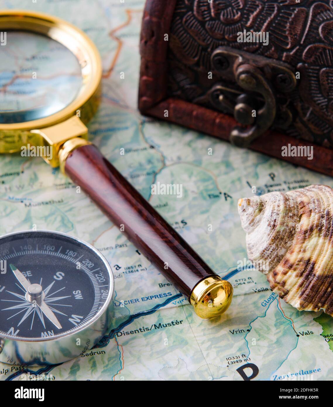The travel concept with compass and map Stock Photo - Alamy