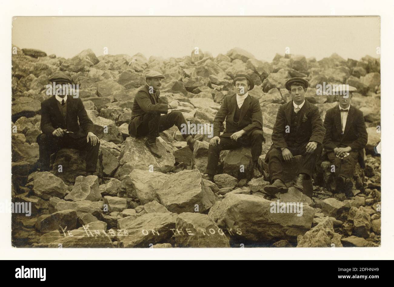 Early 1900's postcard of young men in flat caps and wearing their ...