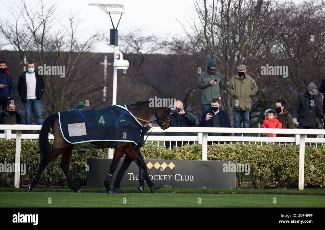 Racegoers around the parade ring ahead of the opening race at Aintree ...