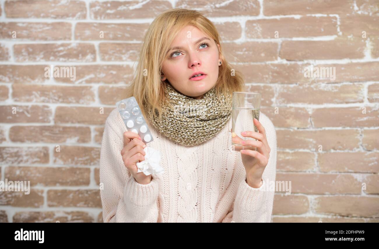 Woman taking tablet from blister hi-res stock photography and images ...