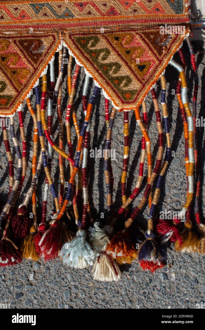 A top vertical view of a colorful carpet. Detailed shapes of a carpet ...