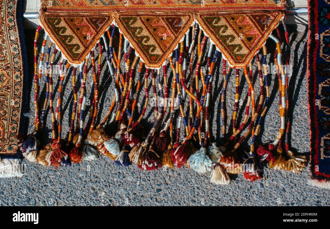 A top vertical of a colorful carpet. Detailed shapes of a carpet on the ...