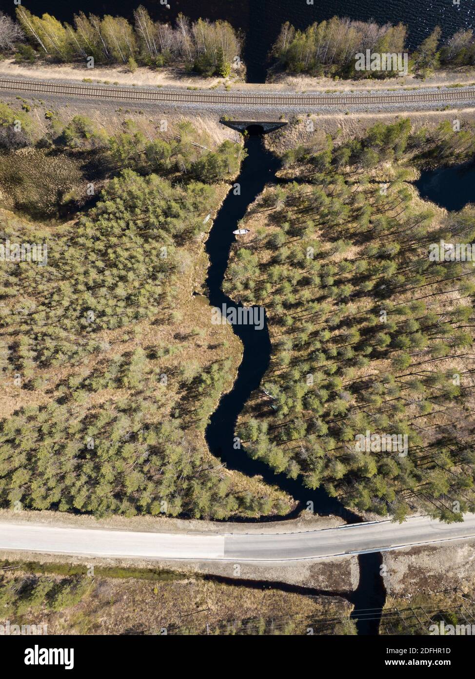 Highway and railroad crossing a river Stock Photo - Alamy