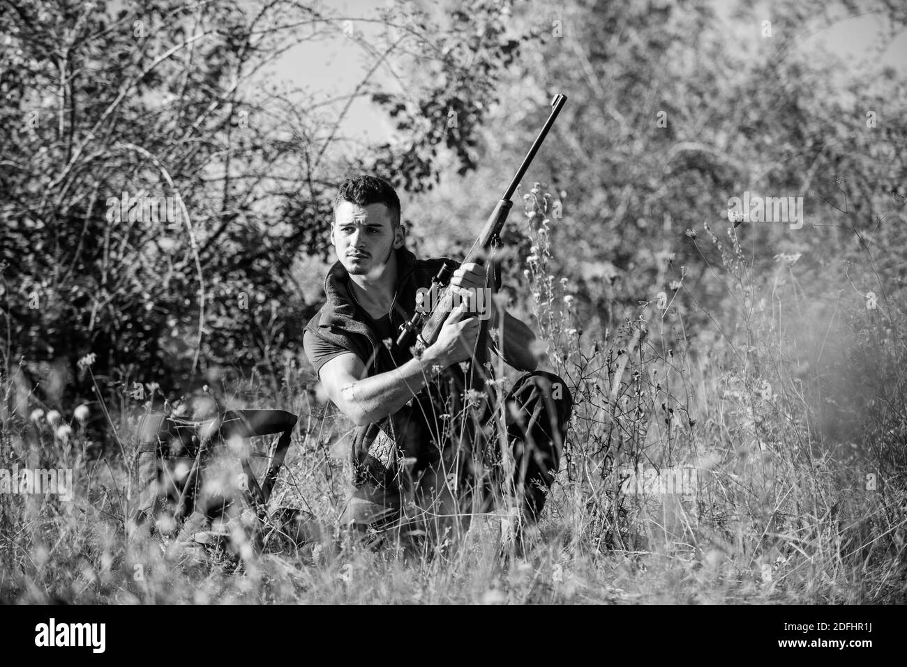 Man hunting wait for animal. Hunter with rifle ready to hunting nature ...
