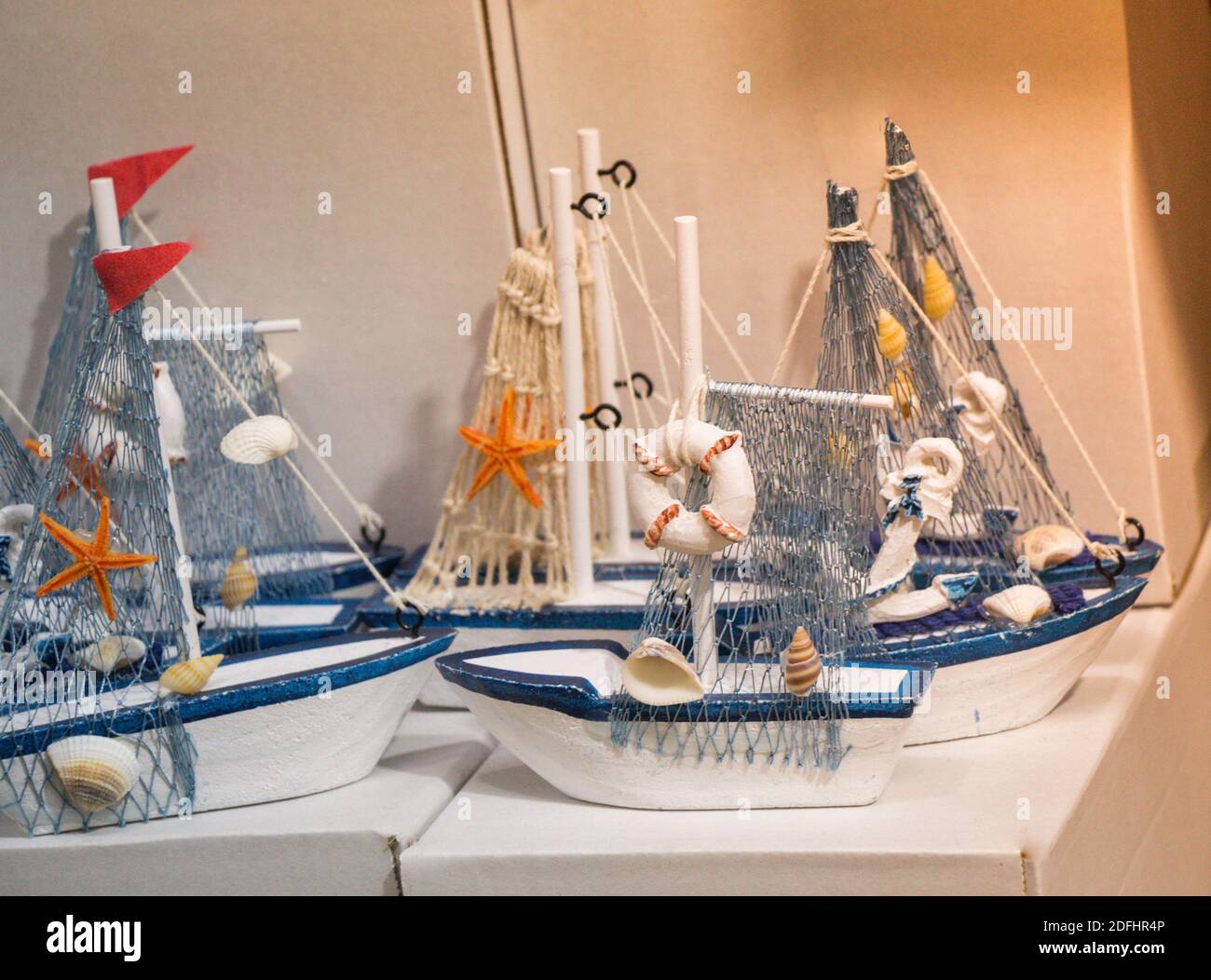 A beautiful shot of figurines in the form of a boat. Port harbor theme ...