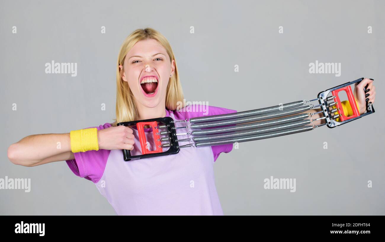 How use equipment proper way. Exercising with expander equipment. Sport ...