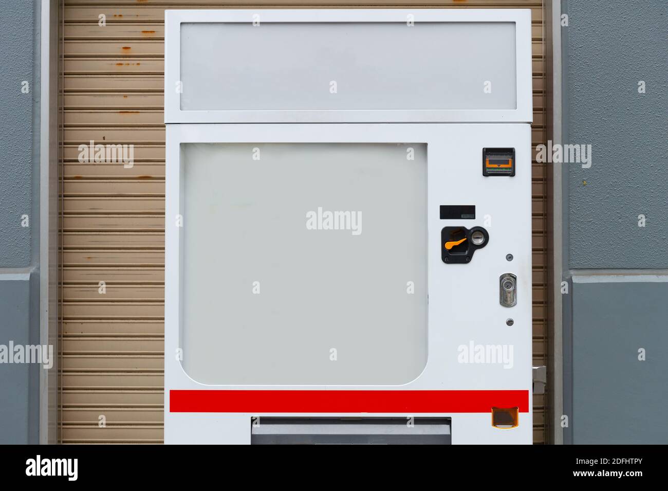 Empty white shelves of standard office vending machine Stock Photo - Alamy