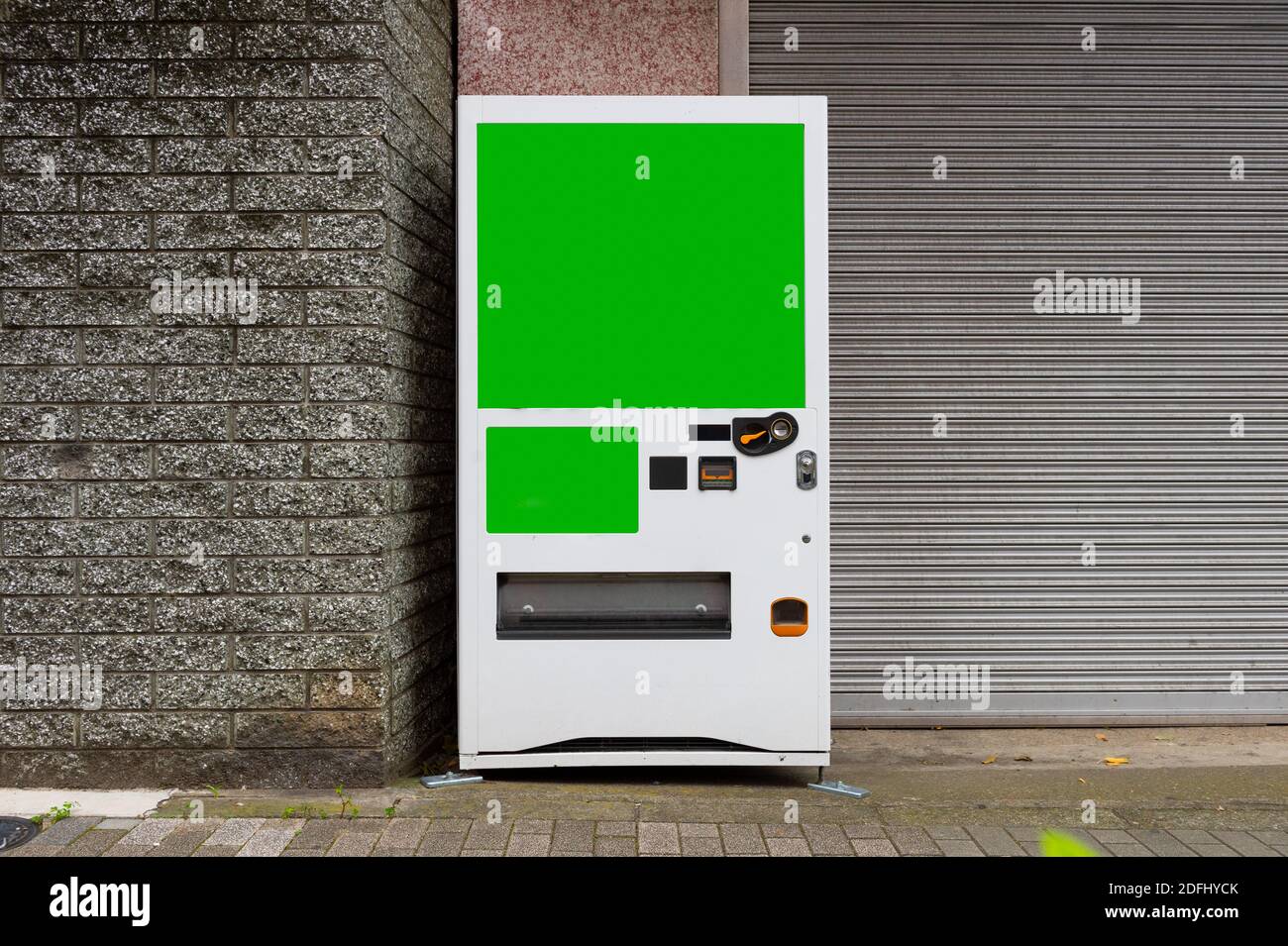 Empty white shelves of standard office vending machine Stock Photo - Alamy