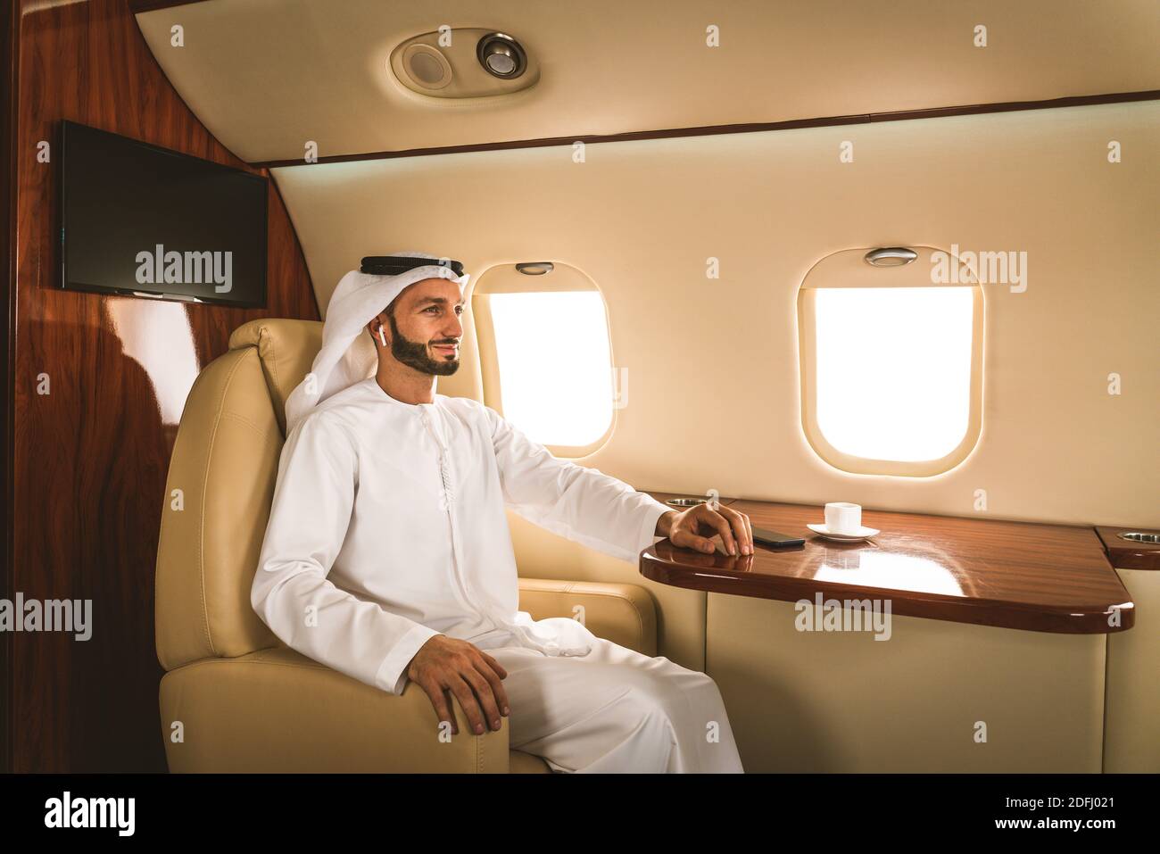 Arabic man wearing kandora in emirates style flying on exclusive ...