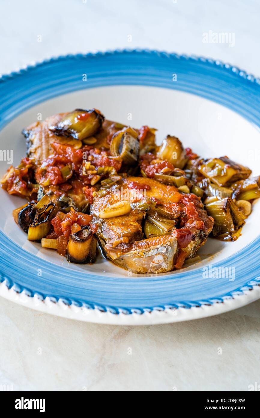Bonito Fish Pieces with Tomato Sauce and Leek in Plate Baked in Oven ...