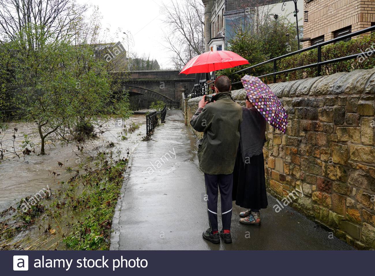 Walker on flooded path hi-res stock photography and images - Alamy
