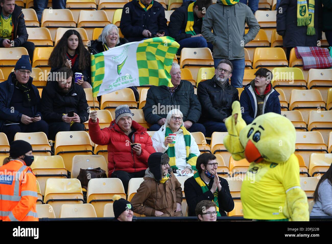 The Norwich City mascot 'Captain Canary' waves to fans in the stands ...
