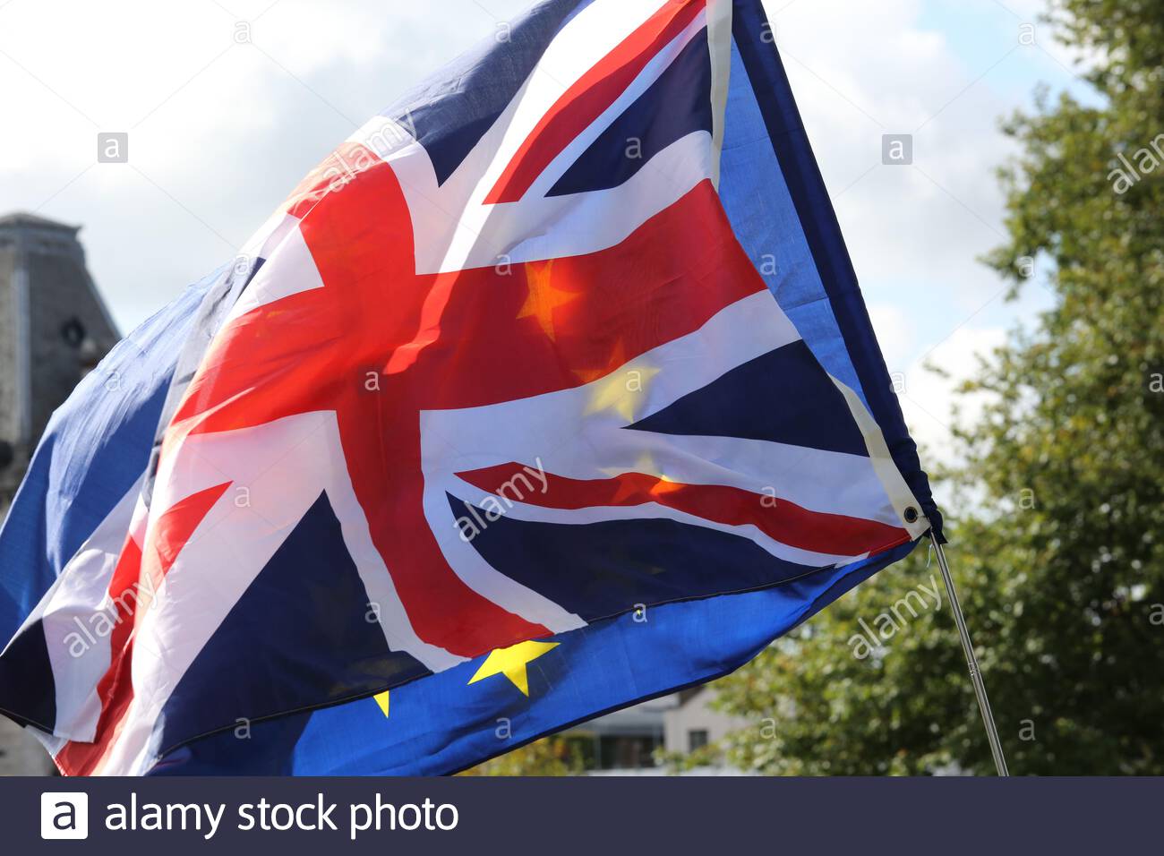 The Union Jack and EU flags mixed together on a flagpole in London ...
