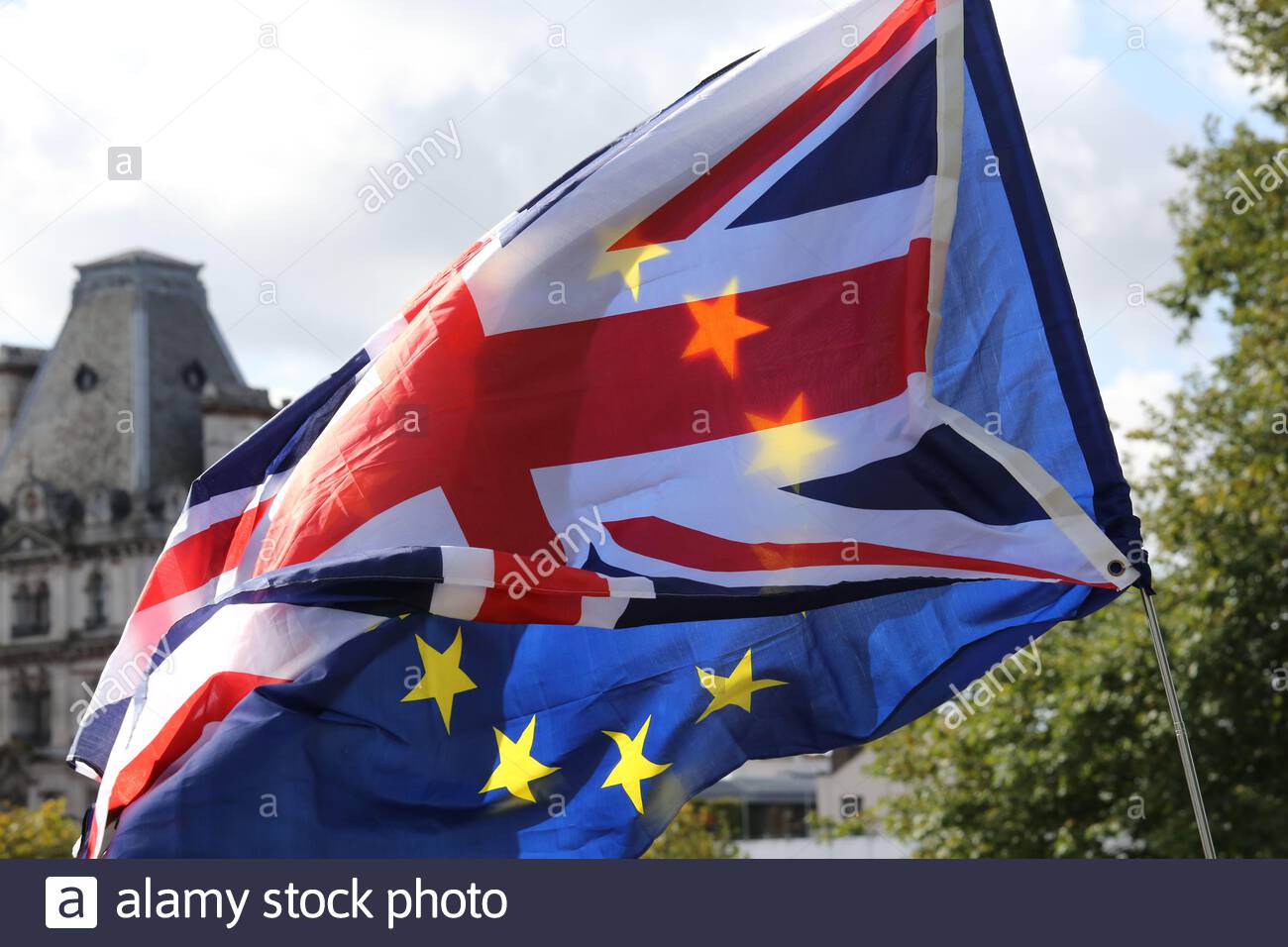 The Union Jack and EU flags mixed together on a flagpole in London ...