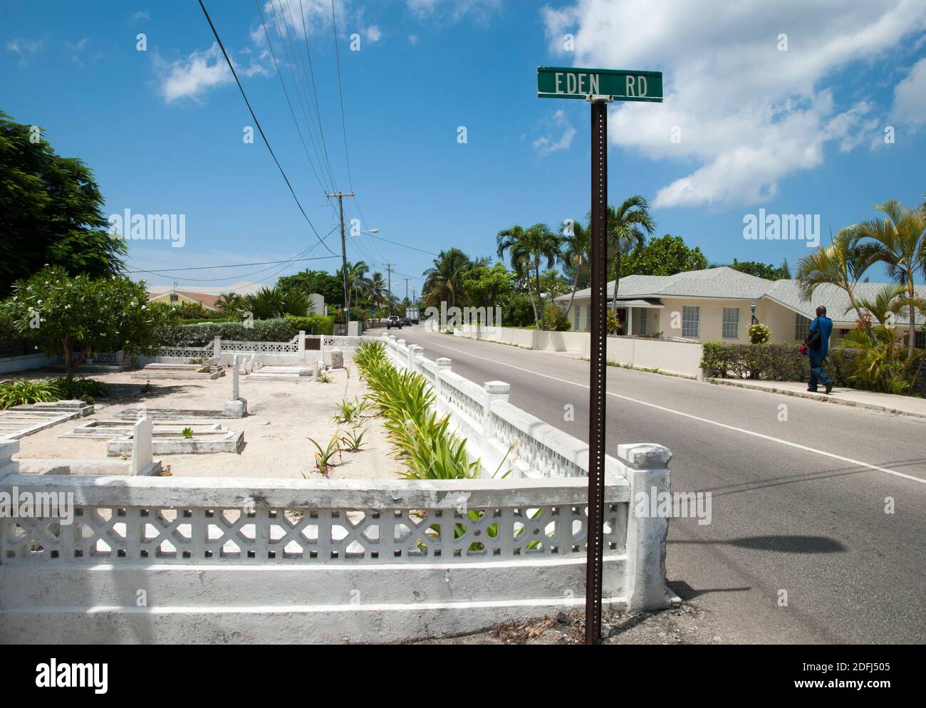 The view of George Town Eden Road with a street sign pole and a little ...