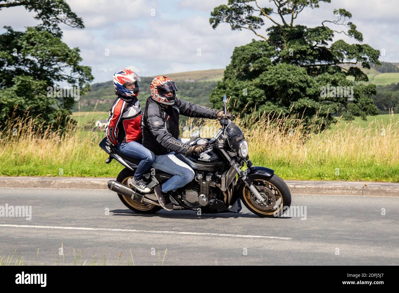 Couple ride motor bike hi-res stock photography and images - Alamy