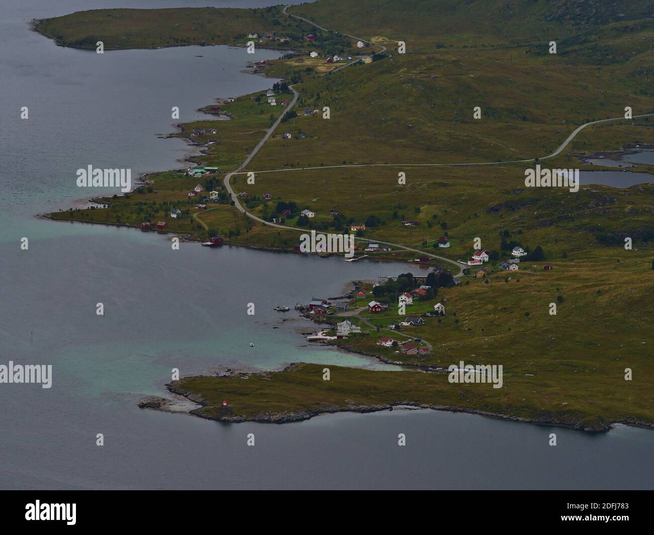 Aerial view of small village Fredvang located on the shore of fjord ...