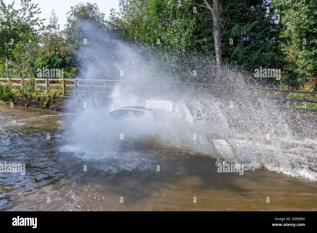 Car splashing through Rufford Ford, Rufford Lane, Rufford Country Park ...