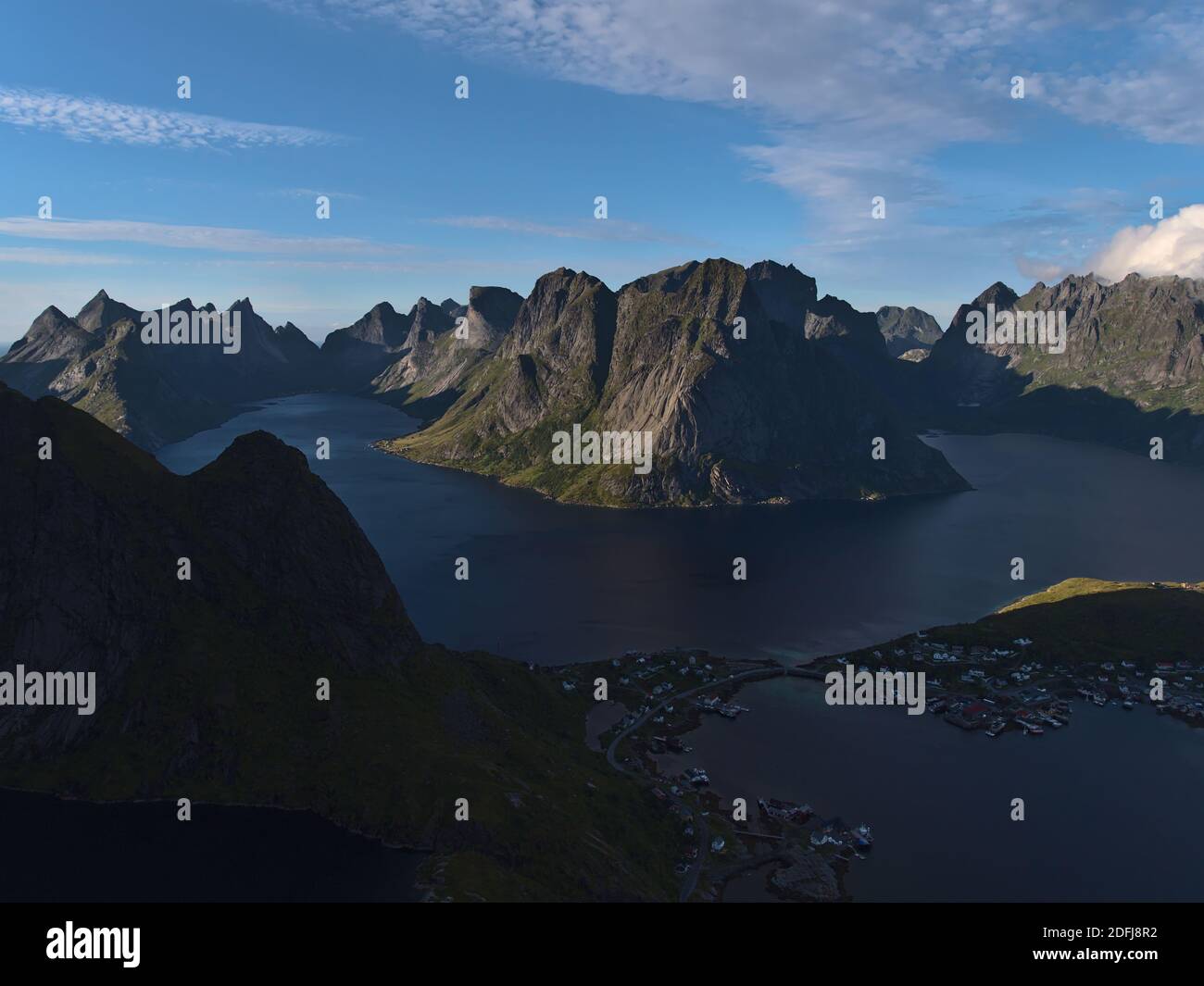 Stunning aerial panorama view of fishing village Reine, calm fjords and ...