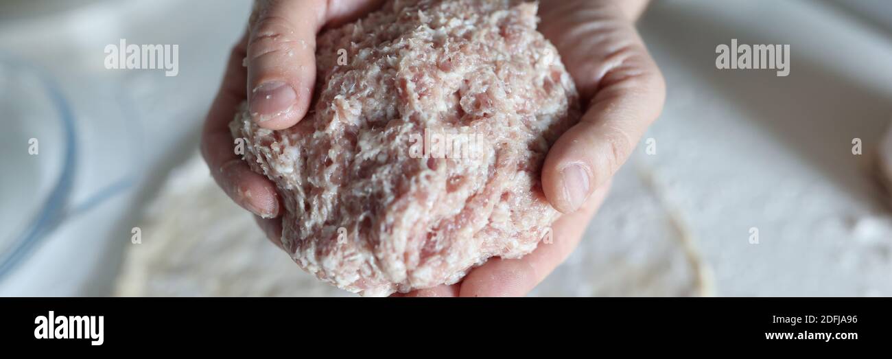 Male hands hold minced meat in palms Stock Photo - Alamy
