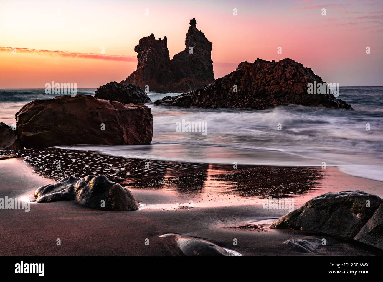 Lighthouse on rocky island timelapse hi-res stock photography and ...