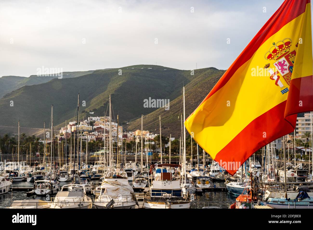 spanish flag on a ship harbor Stock Photo - Alamy