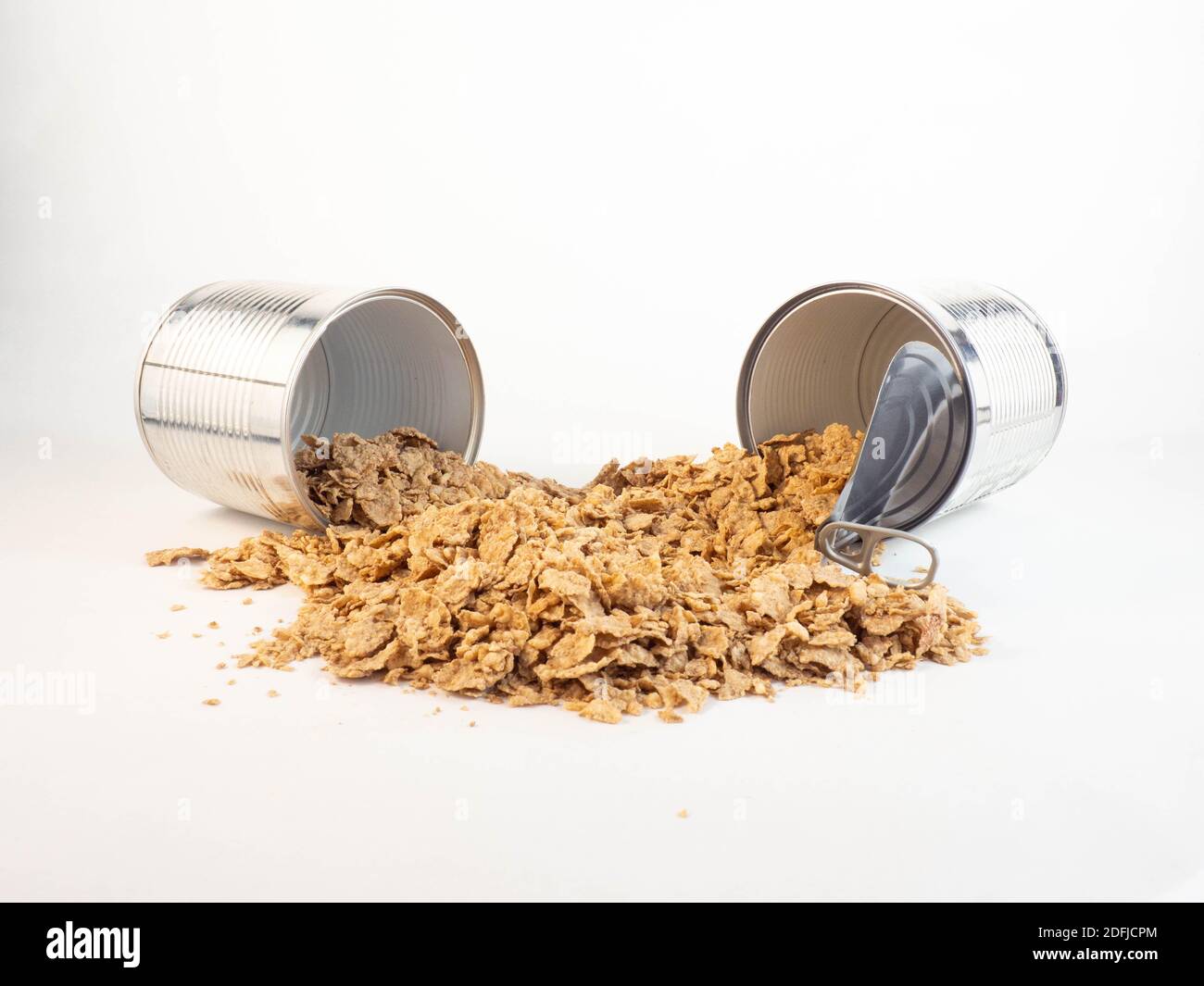 Two cans of canned with corn petals. Concept around food and ...