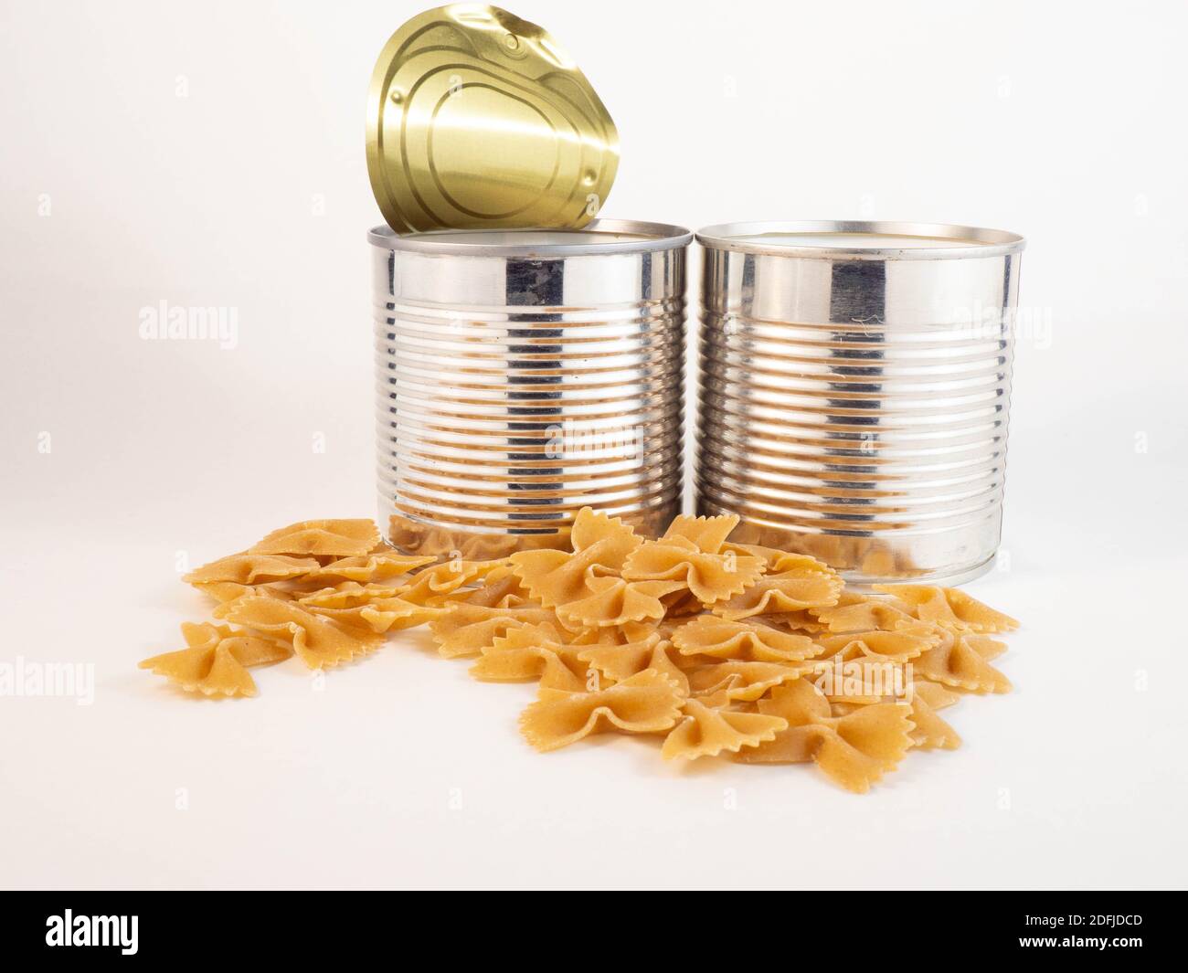 A tin can with farfalle pasta. Concept around catering and consumption ...