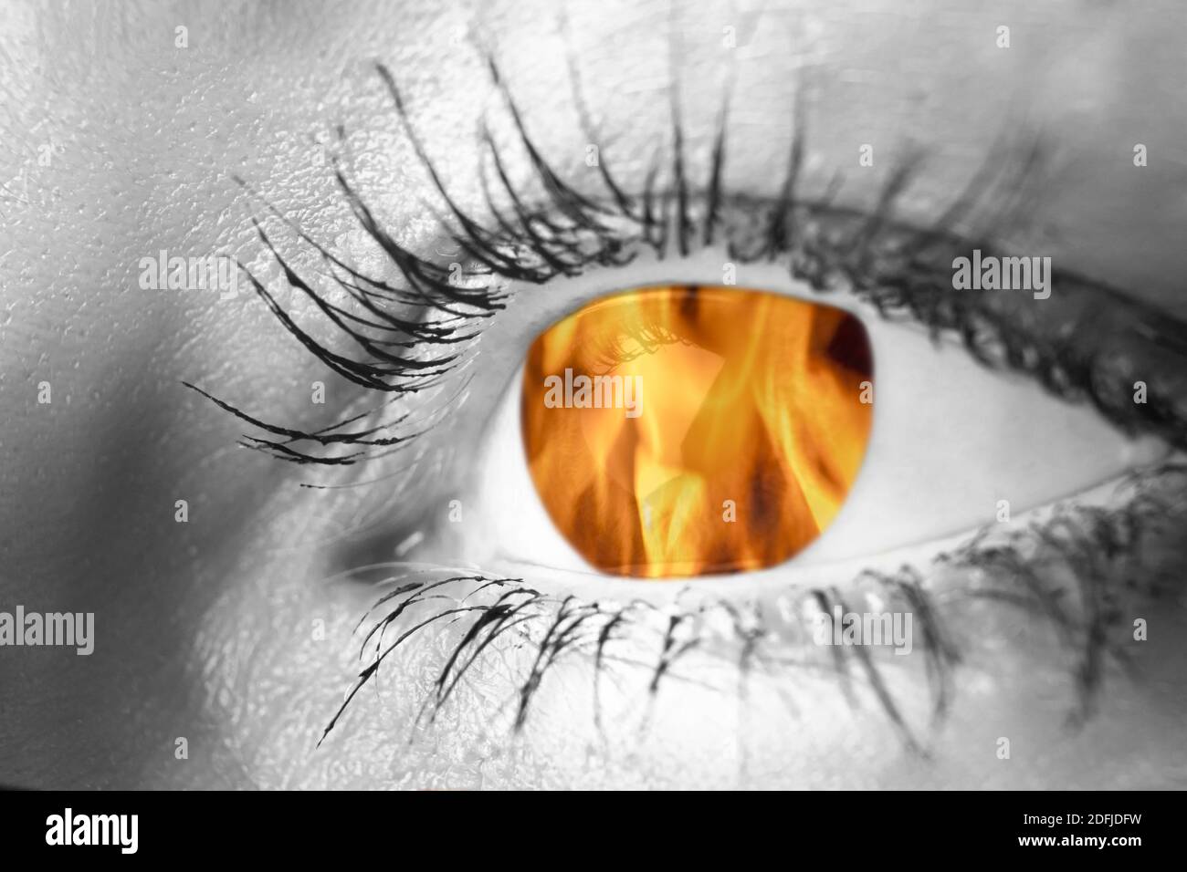 Burning fire eyes hi-res stock photography and images - Alamy