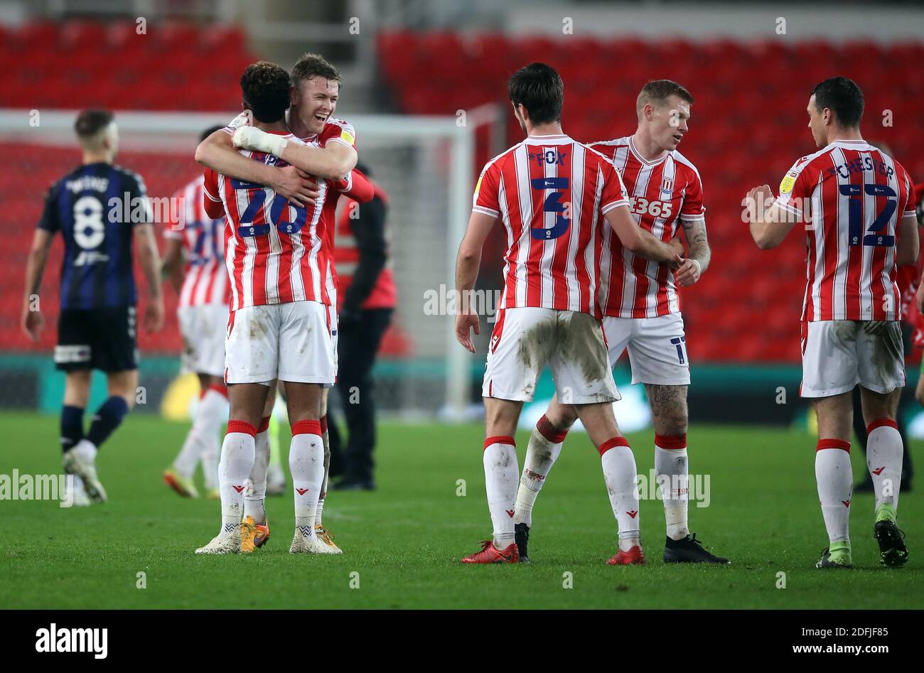 Stoke City goalscorer Nathan Collins celebrates with team mates after ...